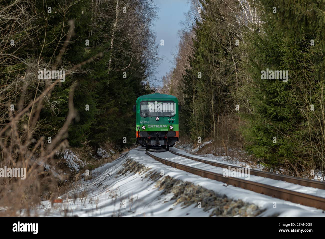 Privat green train engine unit in winter snowy day near Nova Pec CZ 01 ...