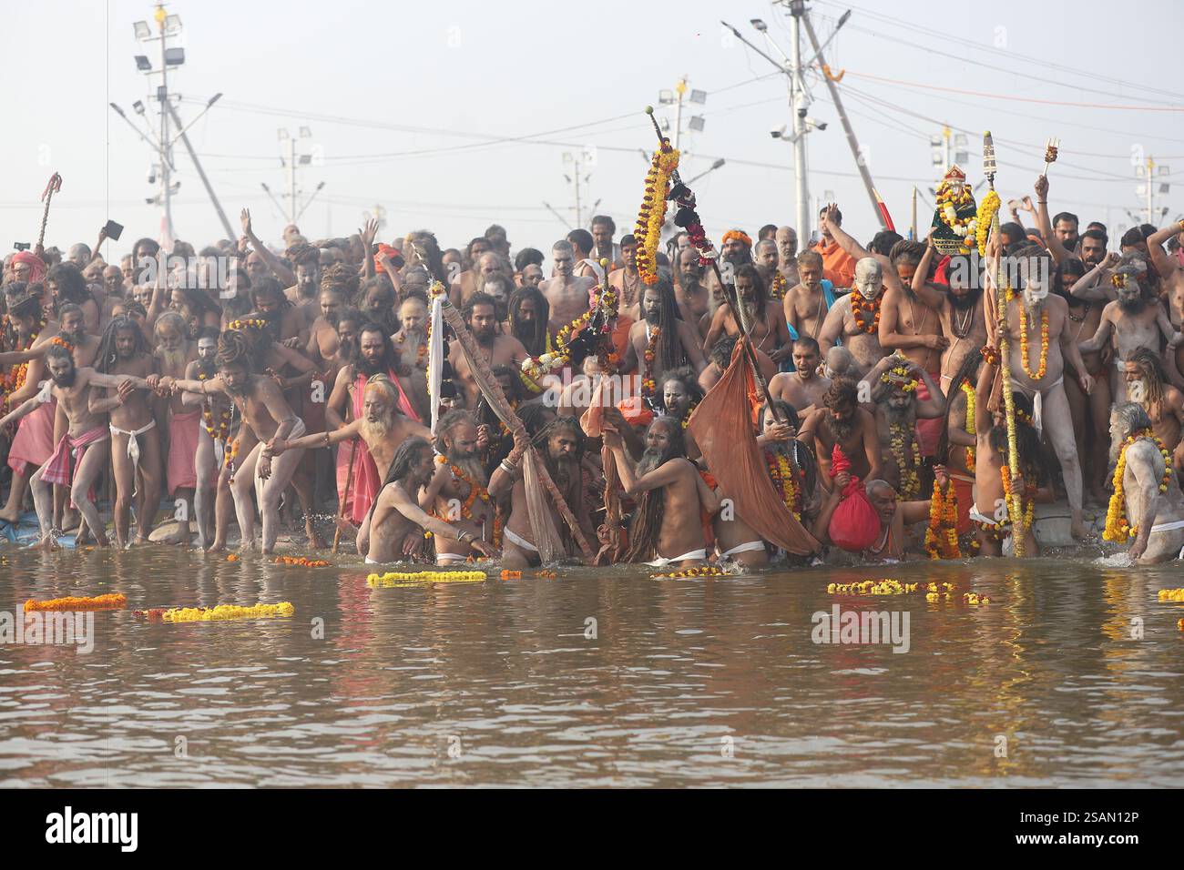Holymen(Sadhus) take holy bath at the bank of Sangam on the occasion of ...