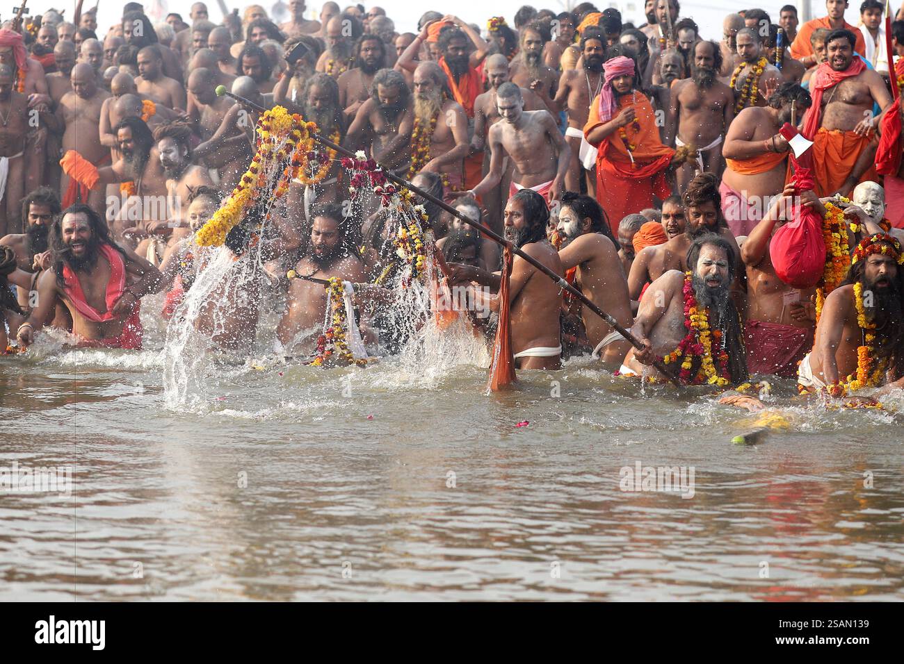 Holymen(Sadhus) take holy bath at the bank of Sangam on the occasion of ...