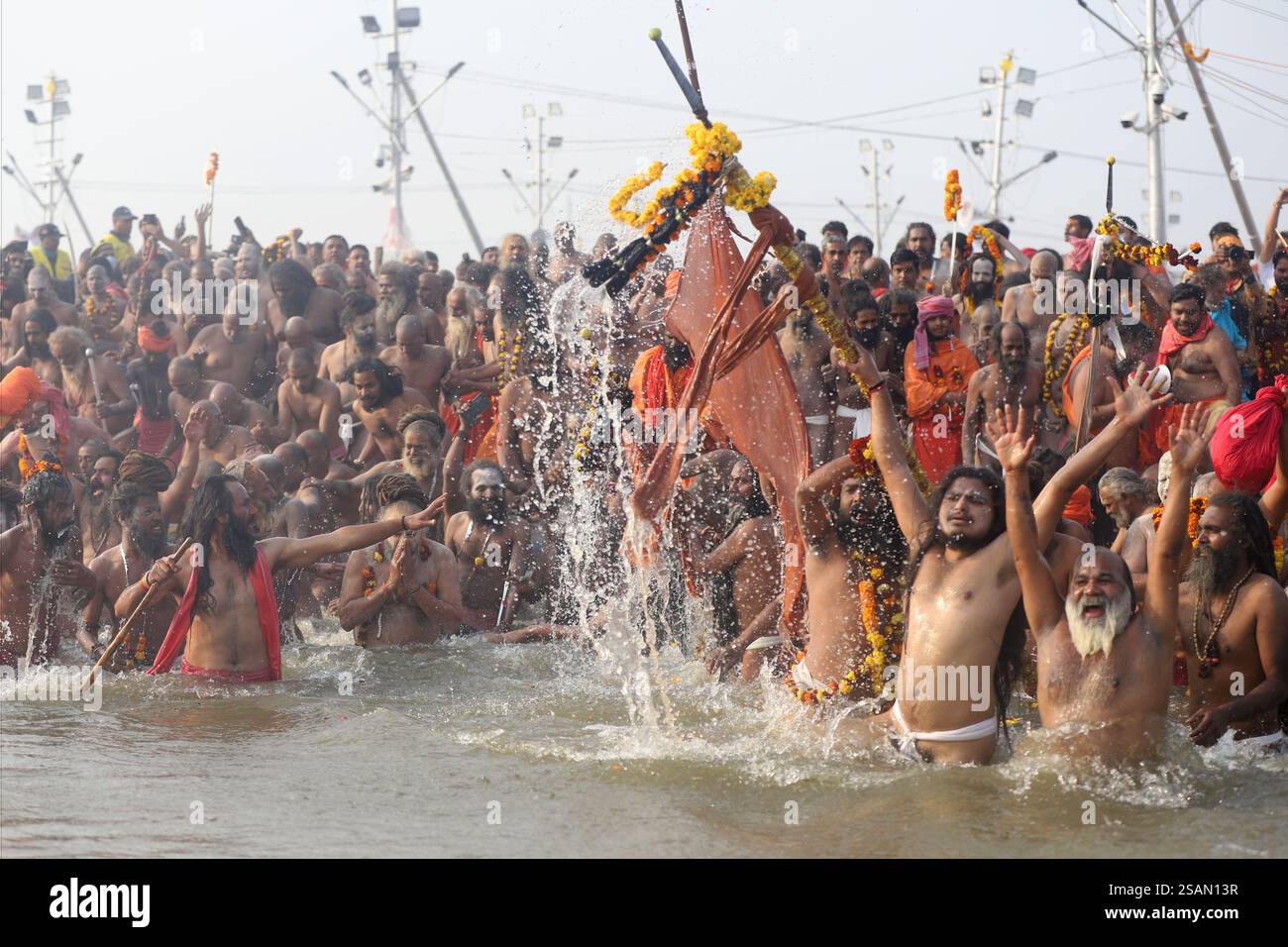 Holymen(Sadhus) take holy bath at the bank of Sangam on the occasion of ...