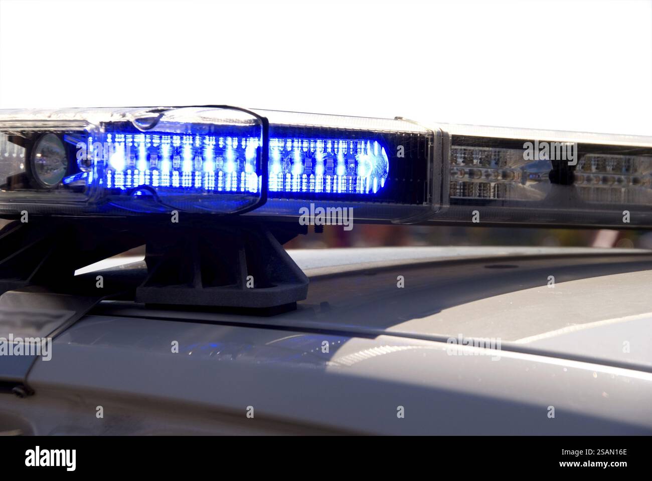 The light bar on top of a police cruiser Stock Photo - Alamy