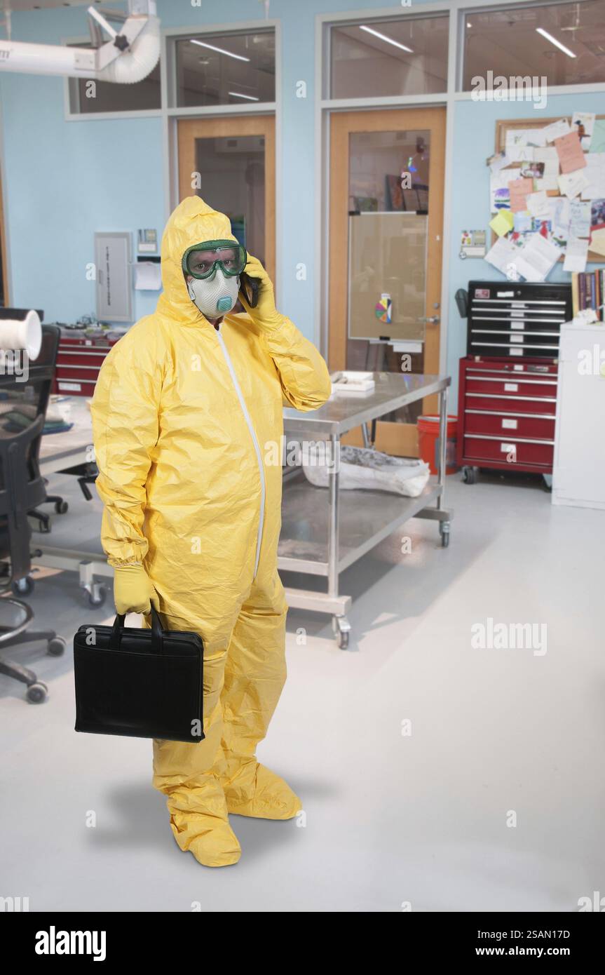 Man wearing a hazmat suit in the face of infectious disease Stock Photo ...