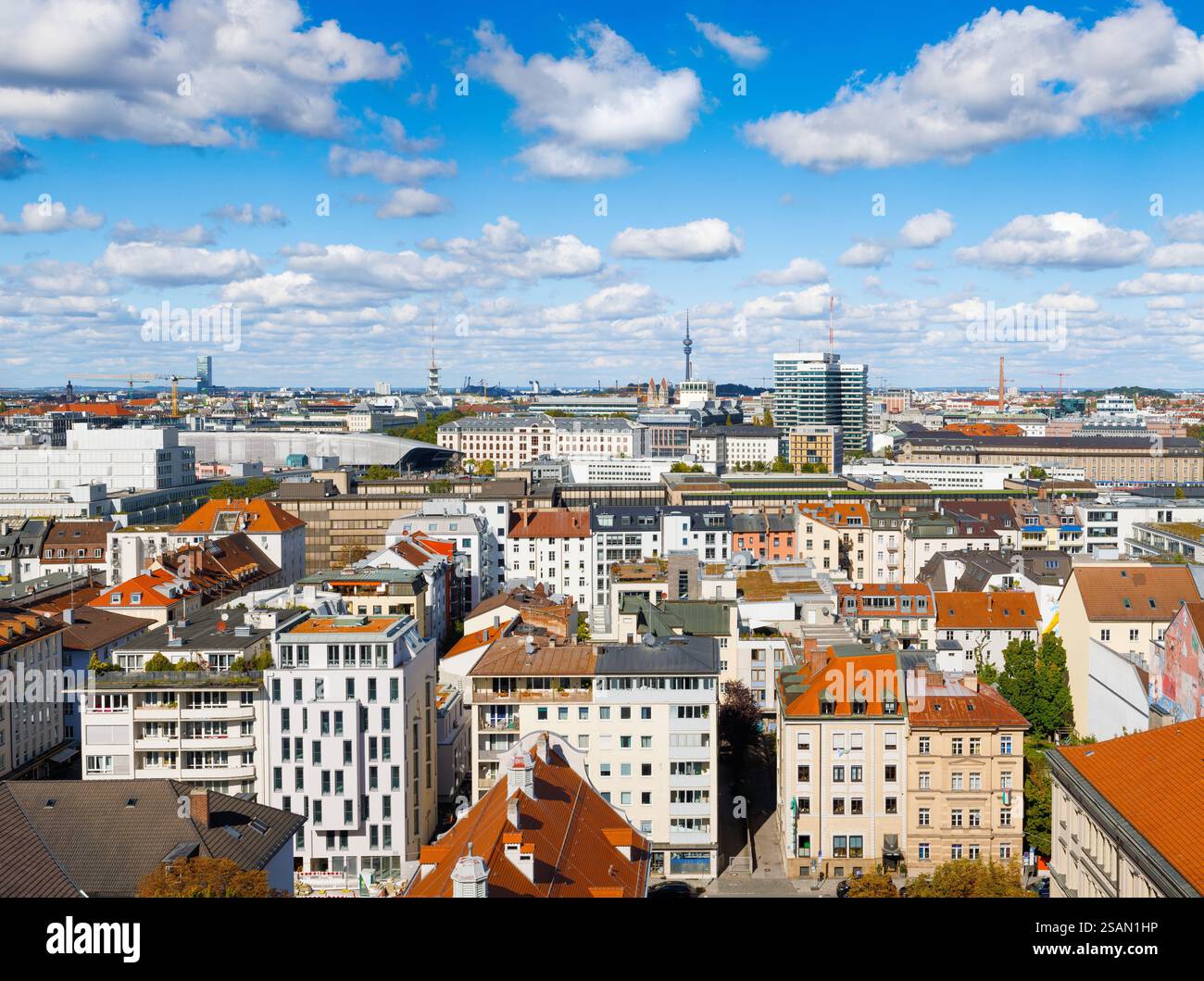 City view of Munich with residential buildings, modern high-rise ...