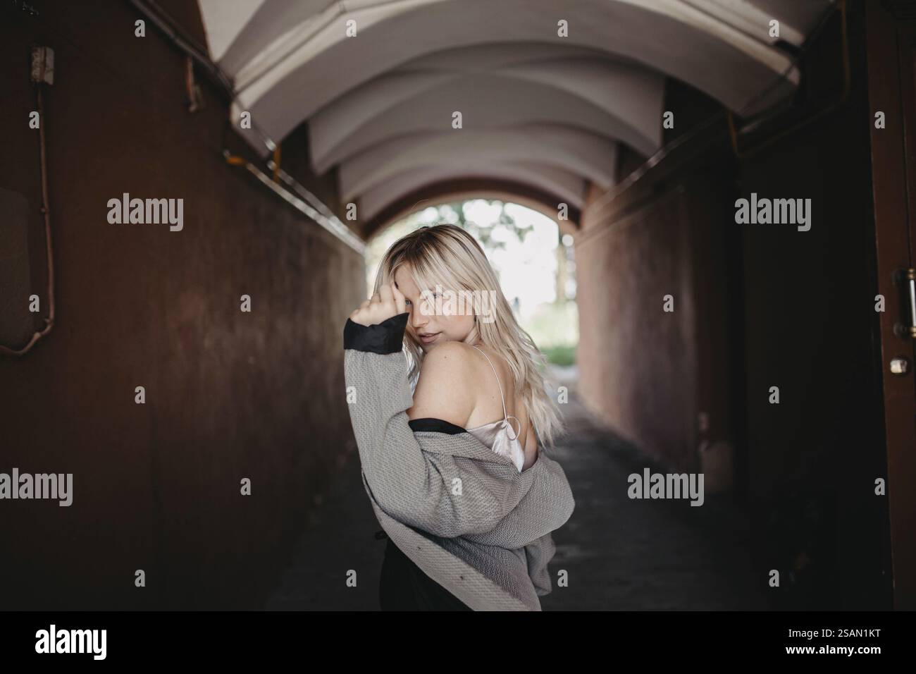 Mysterious pose hi-res stock photography and images - Alamy