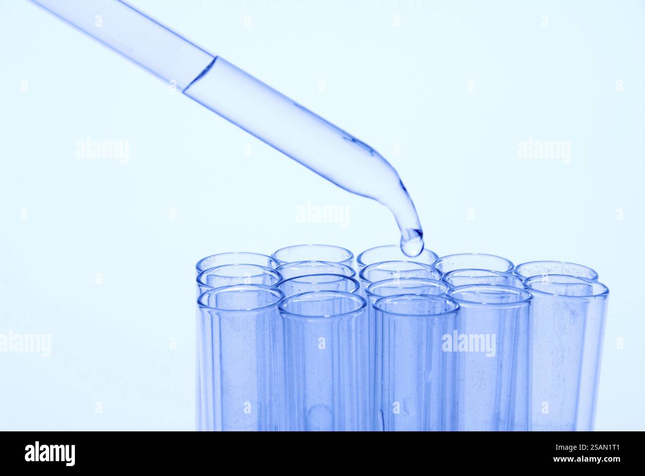 Test tube being fed with an eyedropper Stock Photo - Alamy