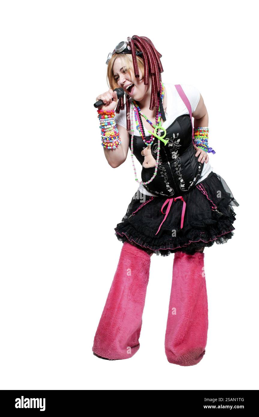 A beautiful woman singer performing at a rave concert Stock Photo - Alamy