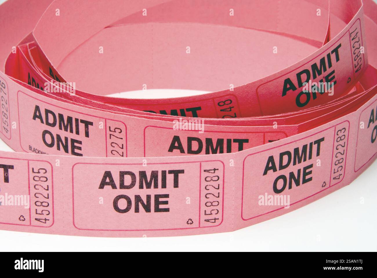 A small roll of retail admission tickets Stock Photo - Alamy