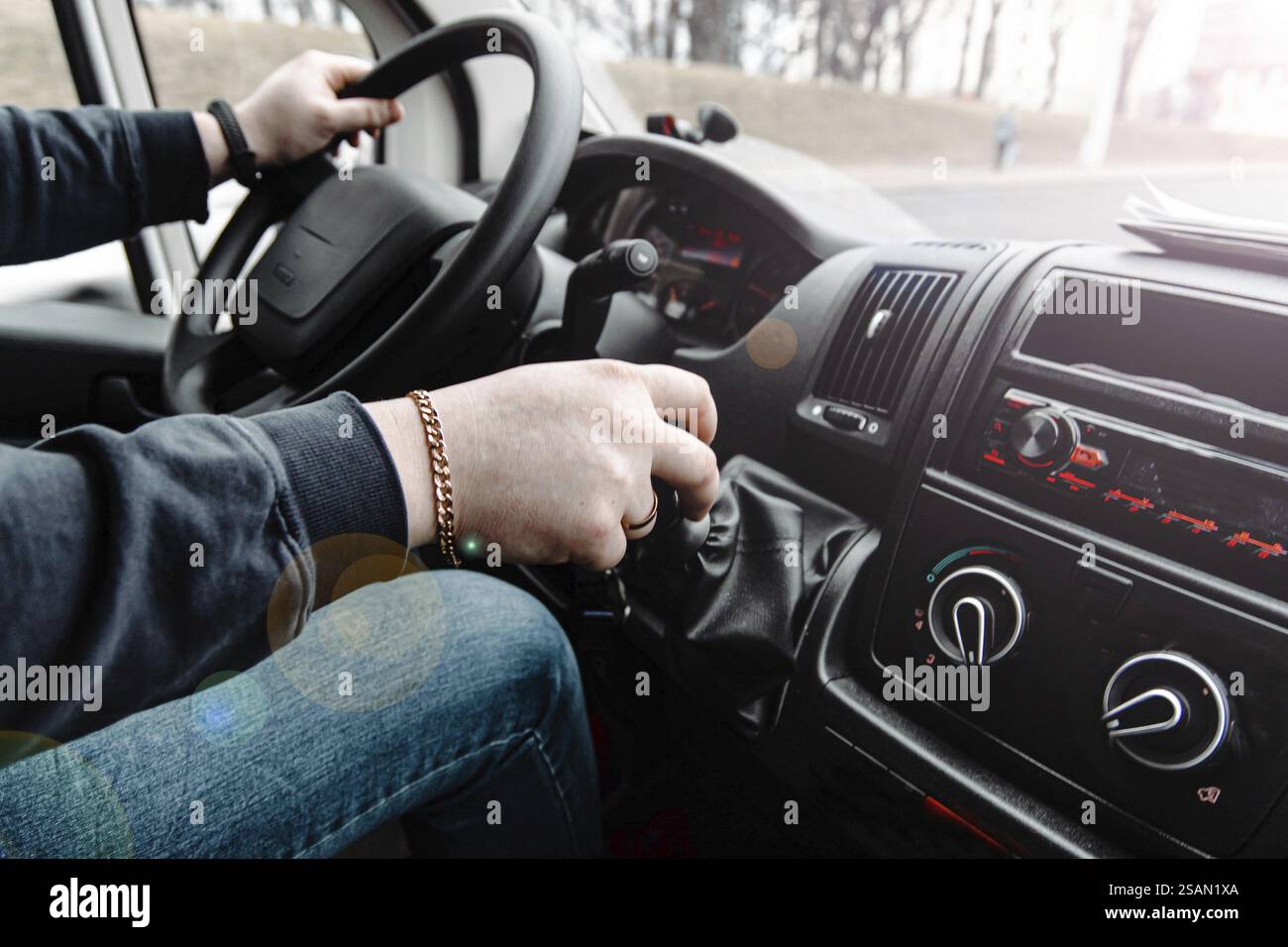 Casual driving scene with manual transmission on a road Stock Photo - Alamy