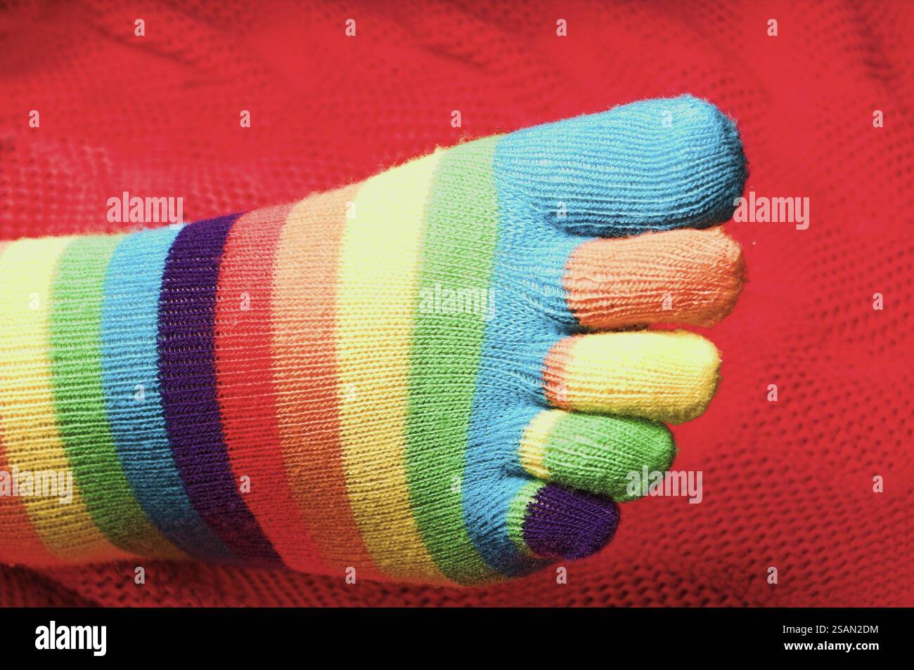 Clean and colorful striped knitted toe socks Stock Photo - Alamy