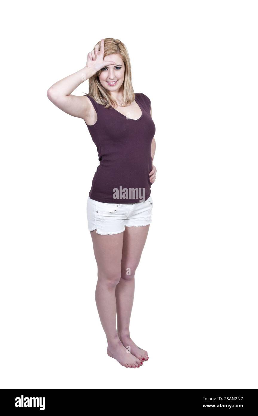A woman making the loser sign with her hand Stock Photo - Alamy