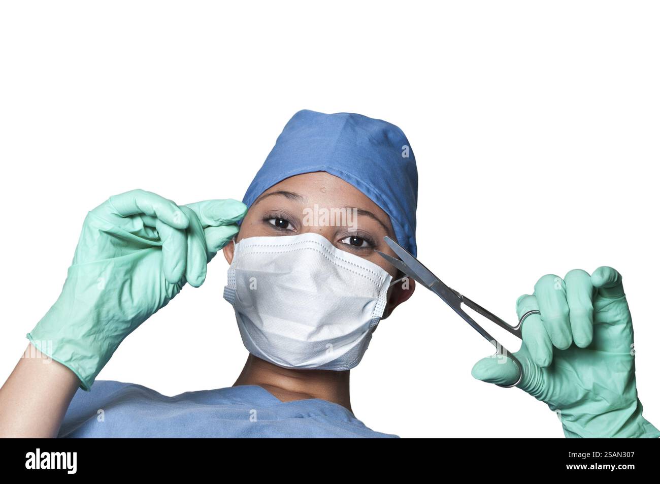 A beautiful young woman surgeon performing surgery Stock Photo - Alamy