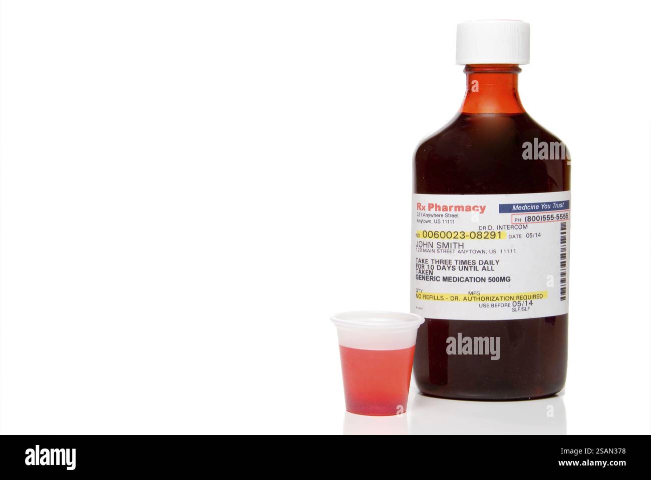 Liquid prescription cough medication in a cup Stock Photo - Alamy