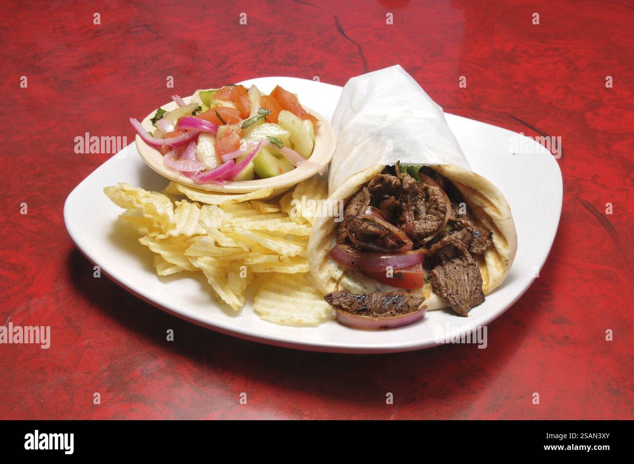 Delicious Greek dish known as a lamb gyro Stock Photo - Alamy