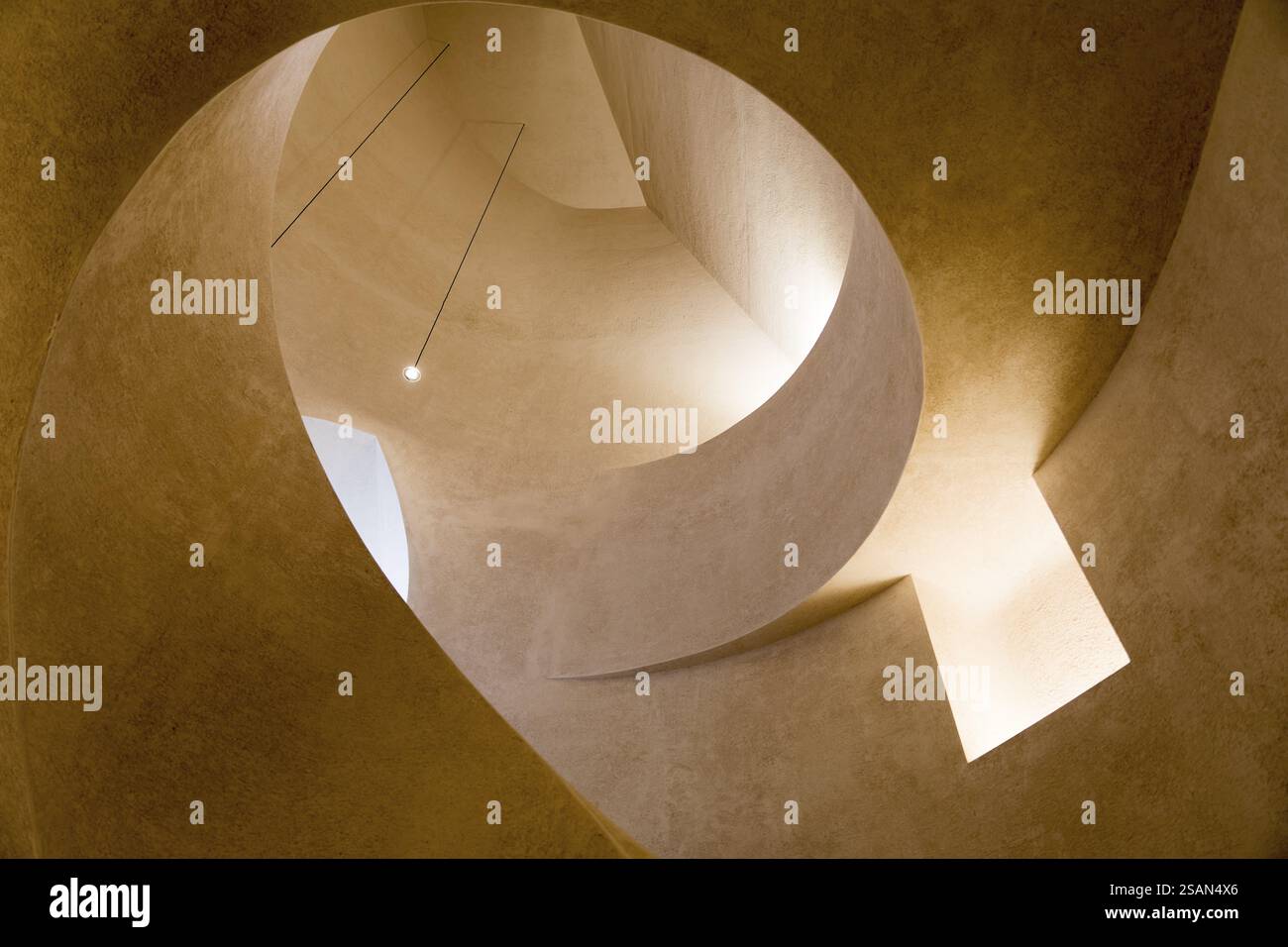 Spiral staircase in the interior of a building Stock Photo - Alamy