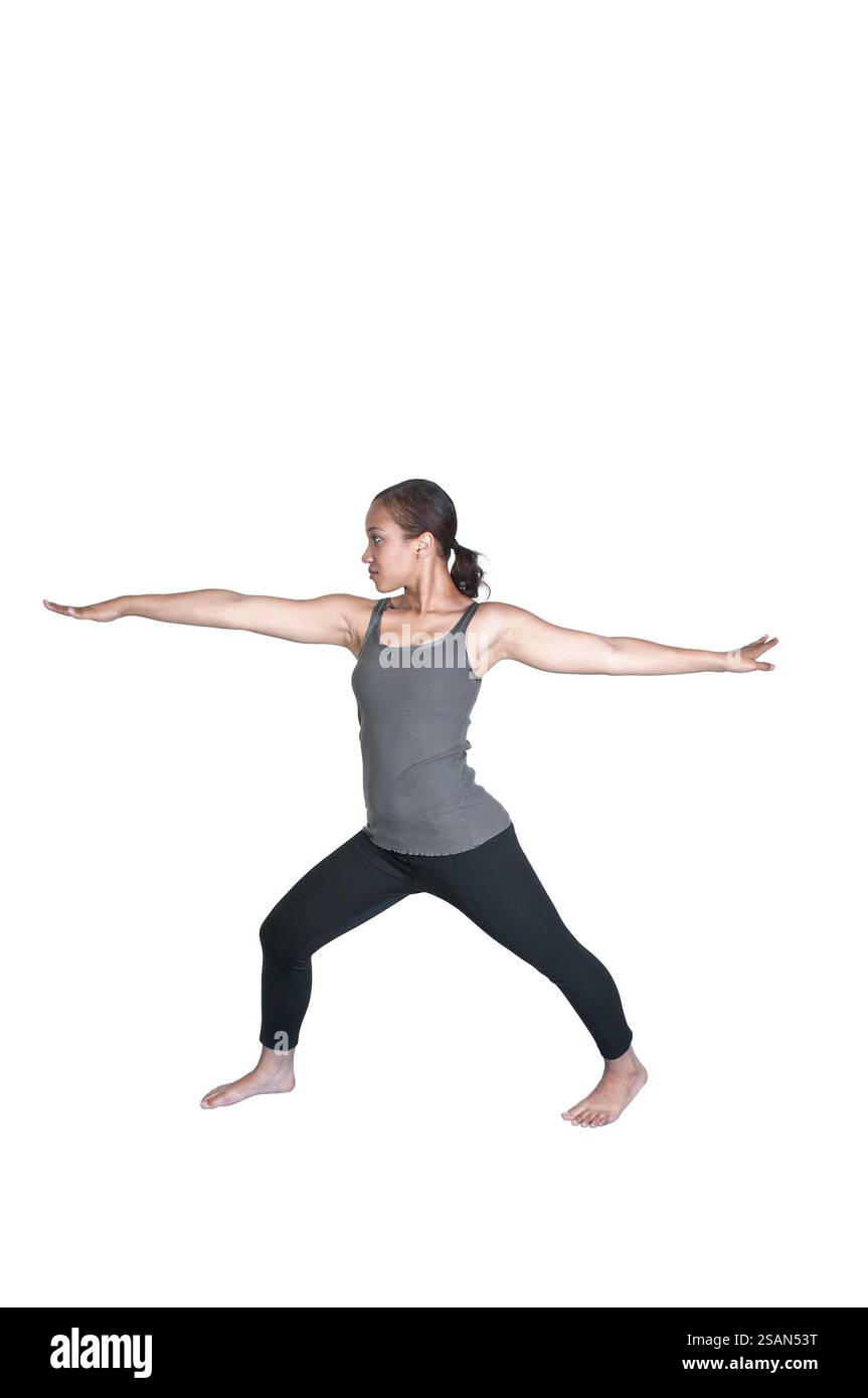 Beautiful black African American woman doing her Yoga stance exercises ...