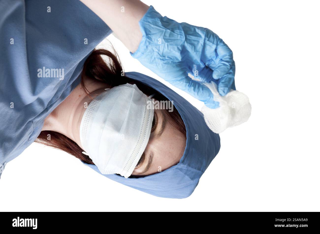 A beautiful young woman surgeon performing surgery Stock Photo - Alamy