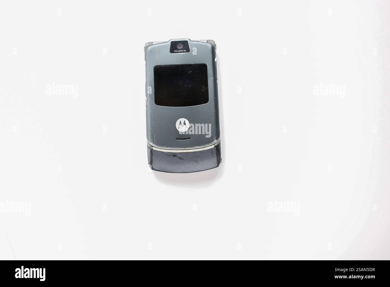 Back view of a Motorola flip phone highlighting the logo and camera in ...