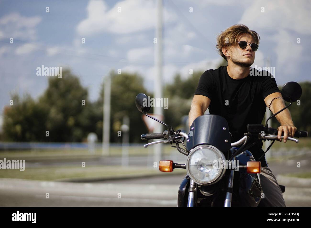 Cool guy on motorcycle hi-res stock photography and images - Alamy