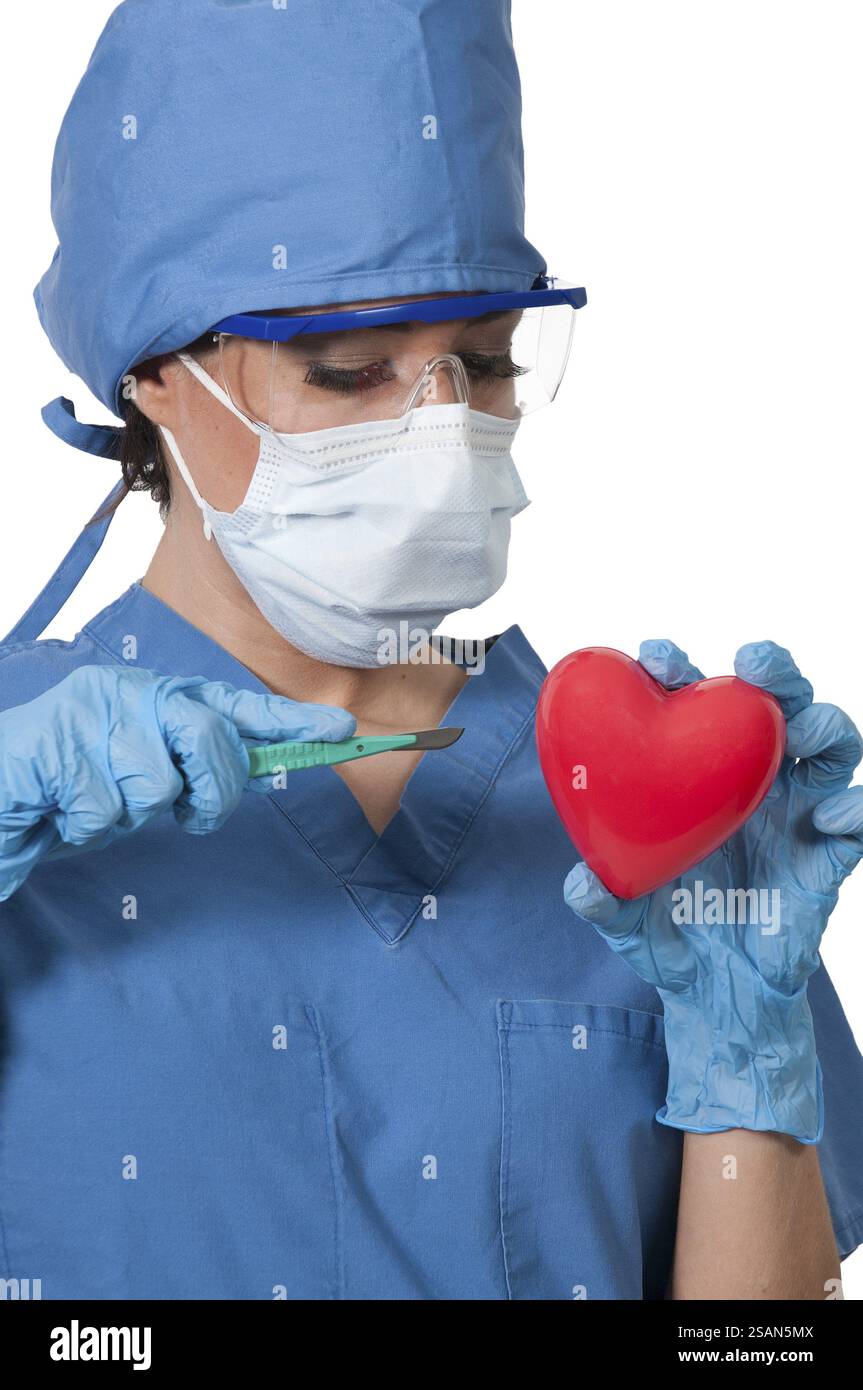 Beautiful young woman cardiology surgeon performing surgery Stock Photo ...