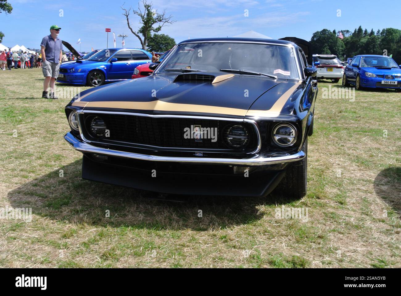 A 1970 Ford Mustang parked on display at the 49th Historic Vehicle ...