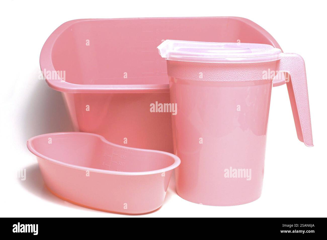 A pink medical wash basin, kidney tray and water pitcher Stock Photo ...