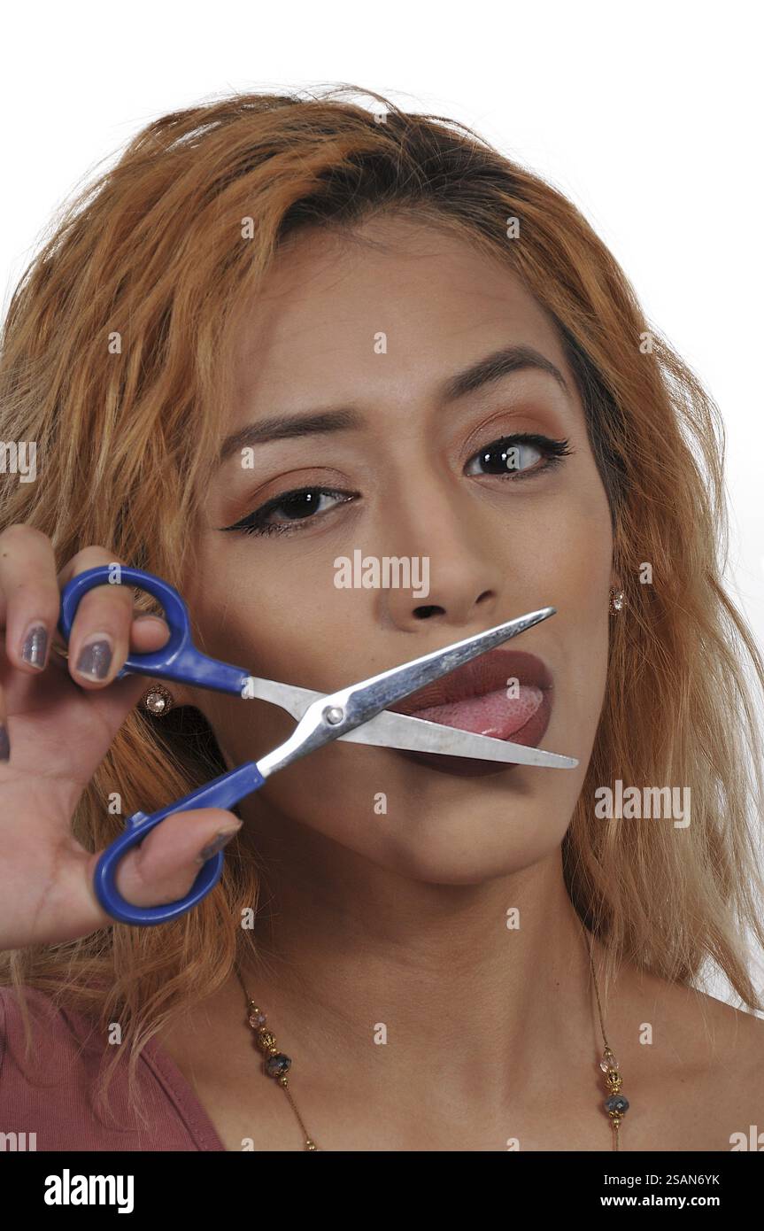 Woman cut tongue scissors hi-res stock photography and images - Alamy