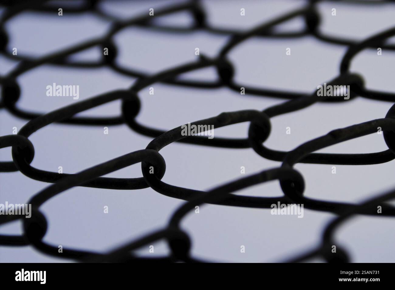 A chain link fence for keeping people out or keeping people in Stock ...