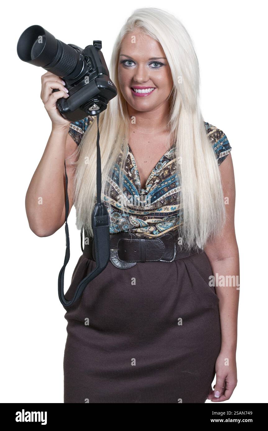Woman holds dslr camera hi-res stock photography and images - Alamy