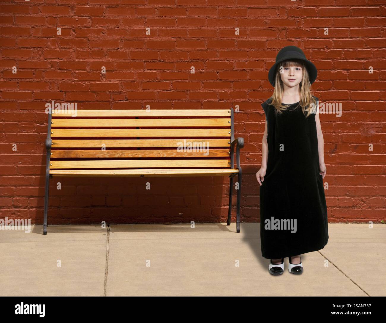 Girl by brickwall hi-res stock photography and images - Alamy