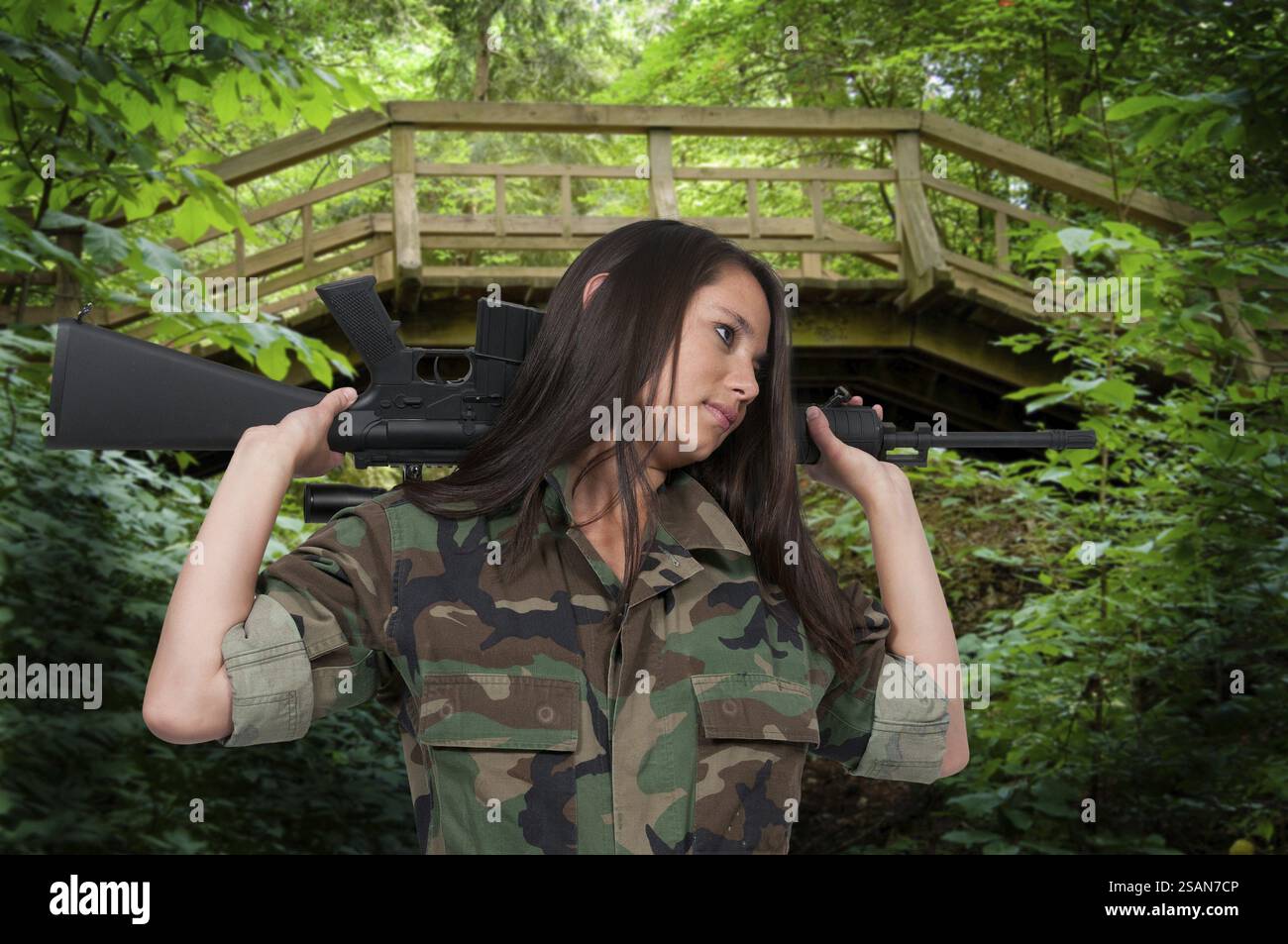 Beautiful young woman soldier with a M16 rifle Stock Photo - Alamy