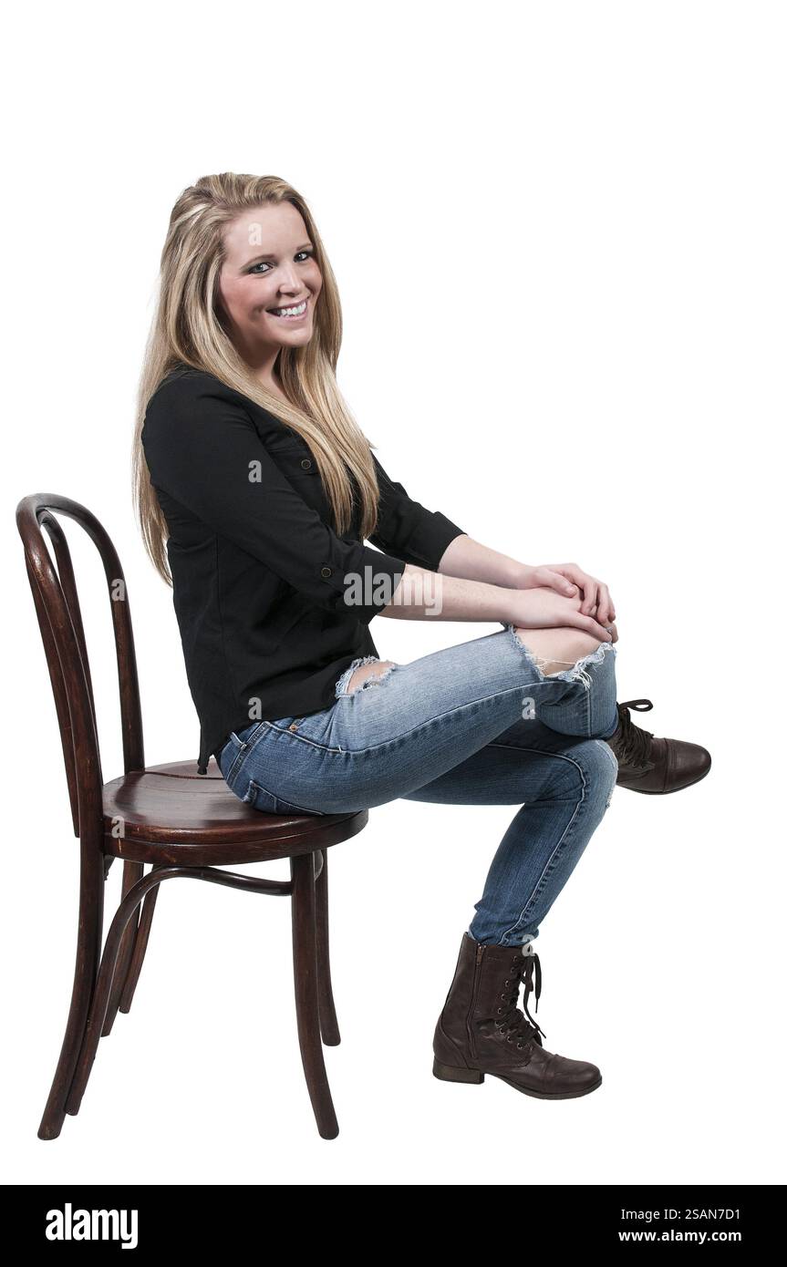 Beautiful women sitting in chair Cut Out Stock Images & Pictures - Alamy