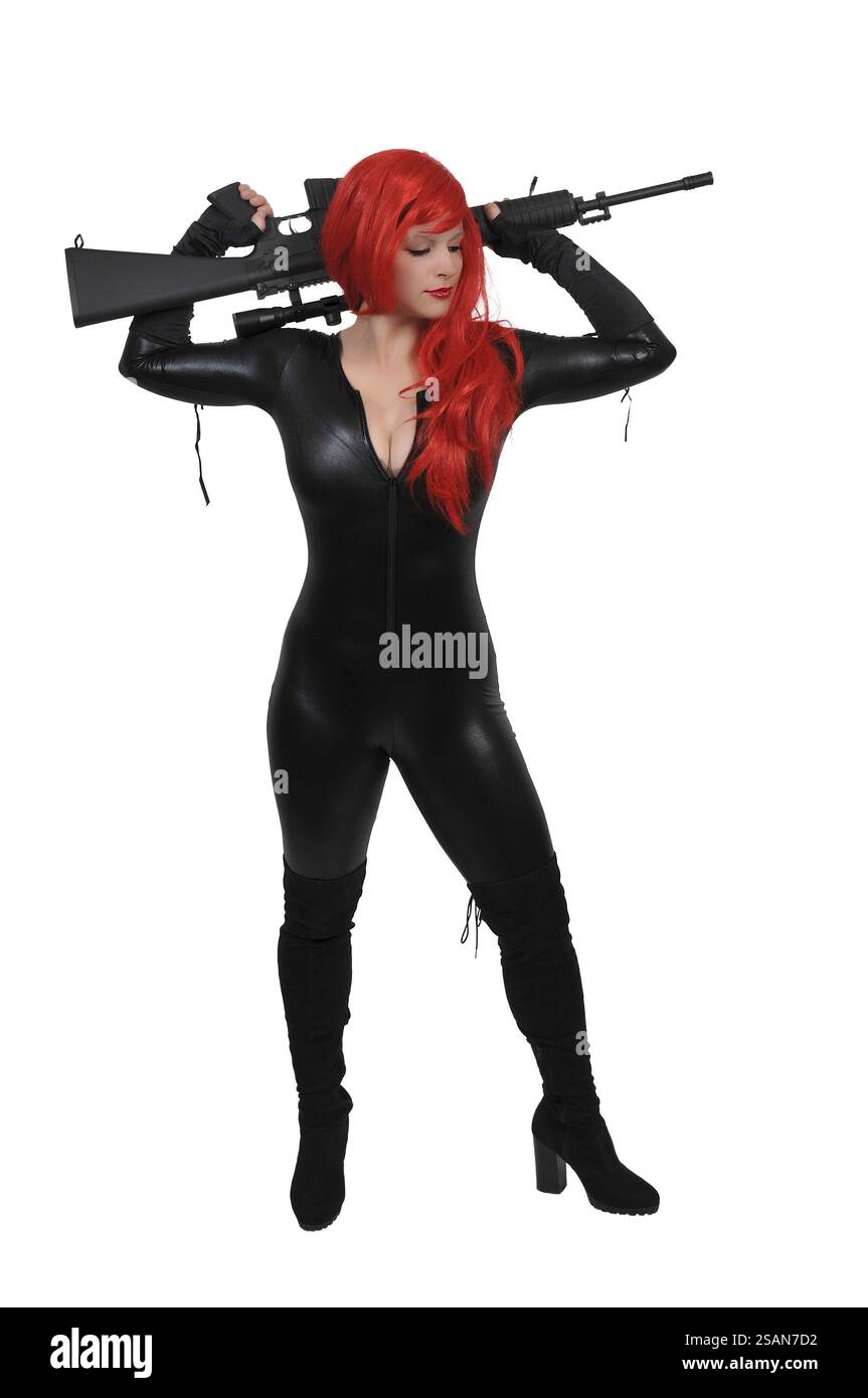 Beautiful young woman soldier with a rifle Stock Photo - Alamy