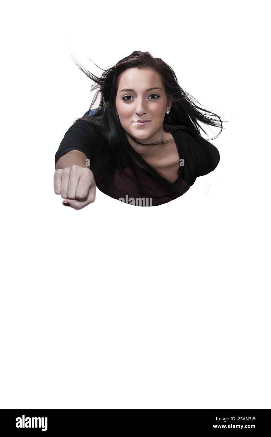 Beautiful young woman flying through the sky Stock Photo - Alamy