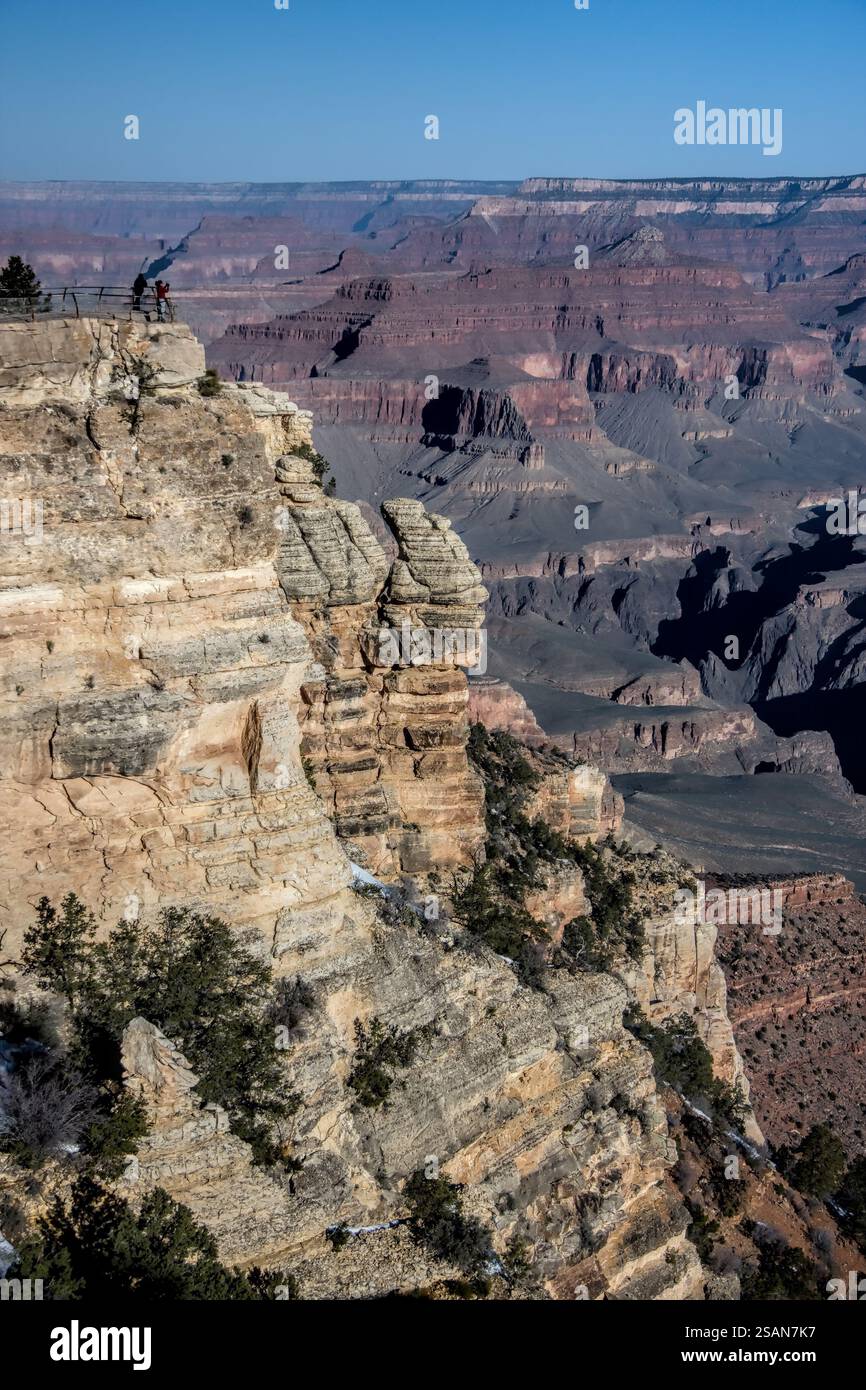 A mountain with a cliff and a bench. The mountain is brown Stock Photo ...