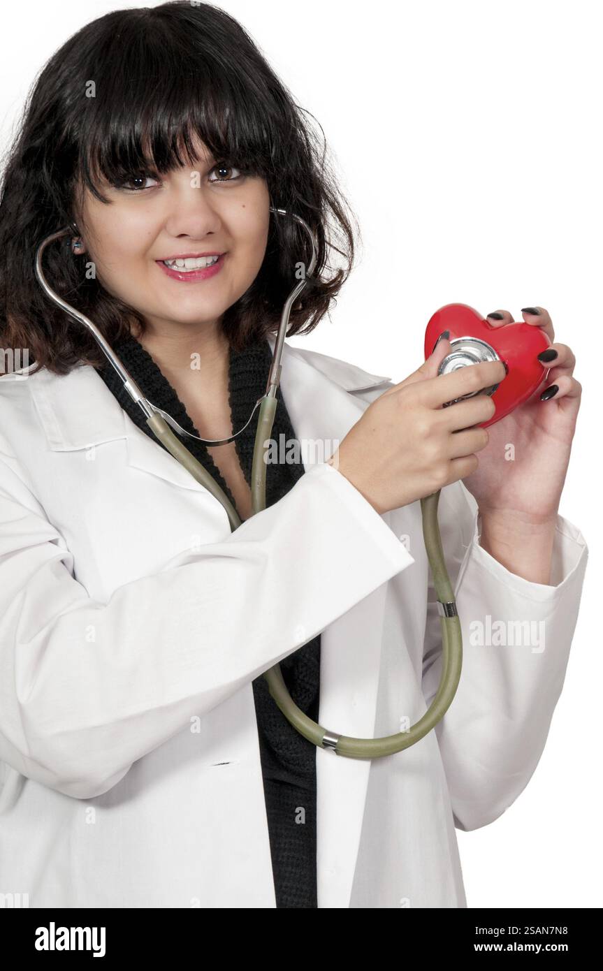 Beautiful young woman cardiologist doctor holding a heart Stock Photo ...