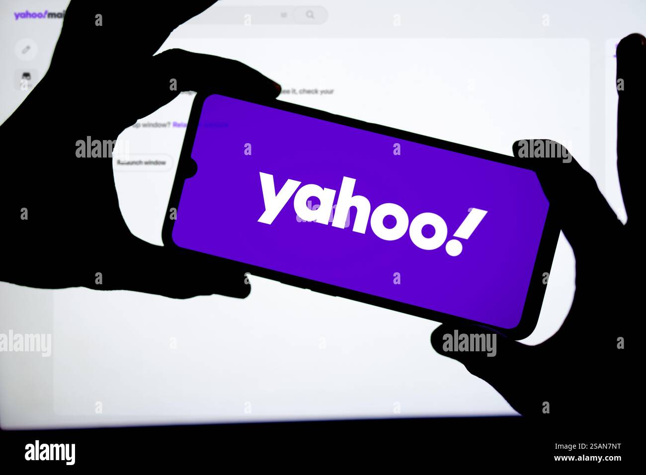 Yahoo logo on phone screen stock image Stock Photo - Alamy