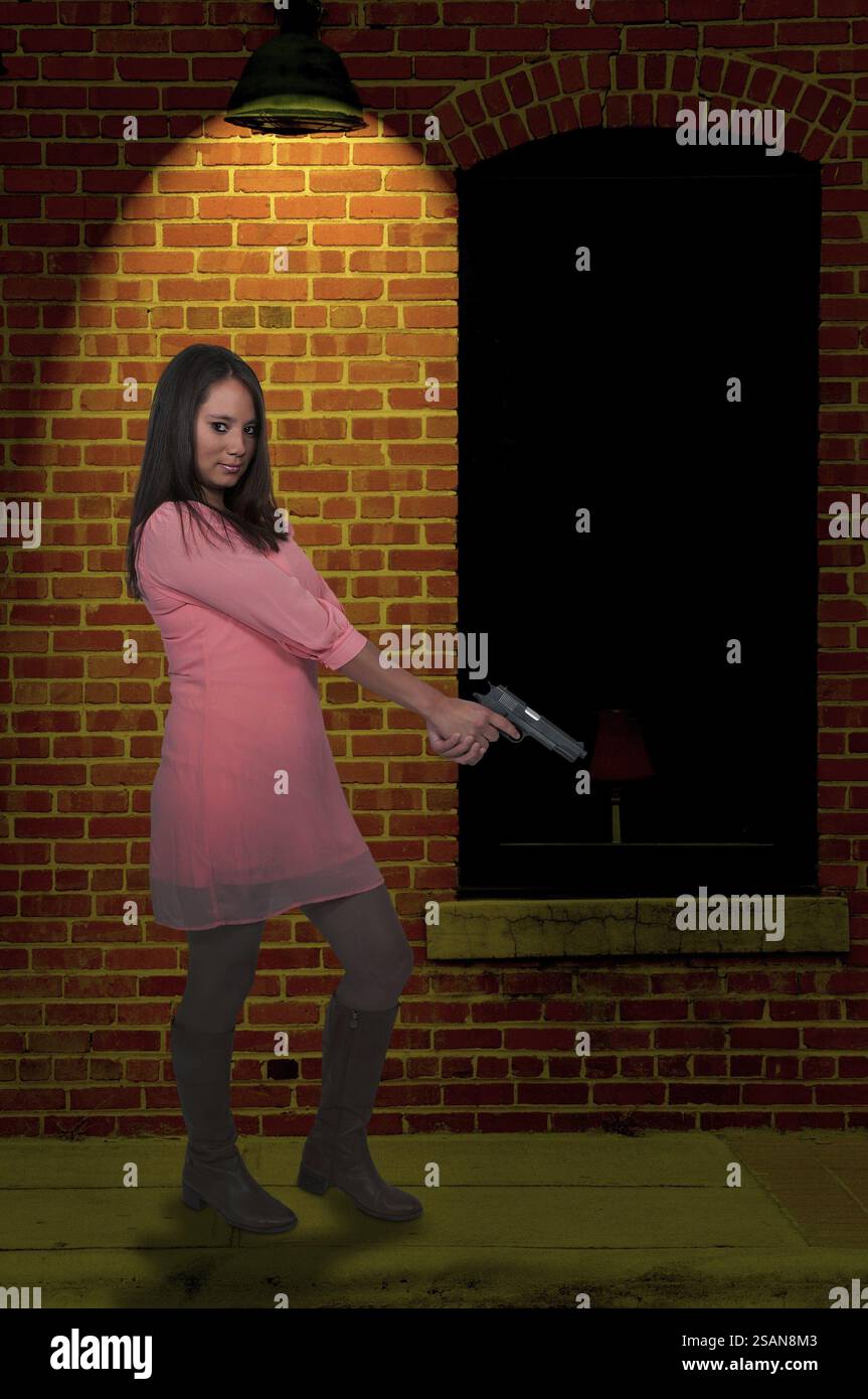 Women loading a gun hi-res stock photography and images - Alamy