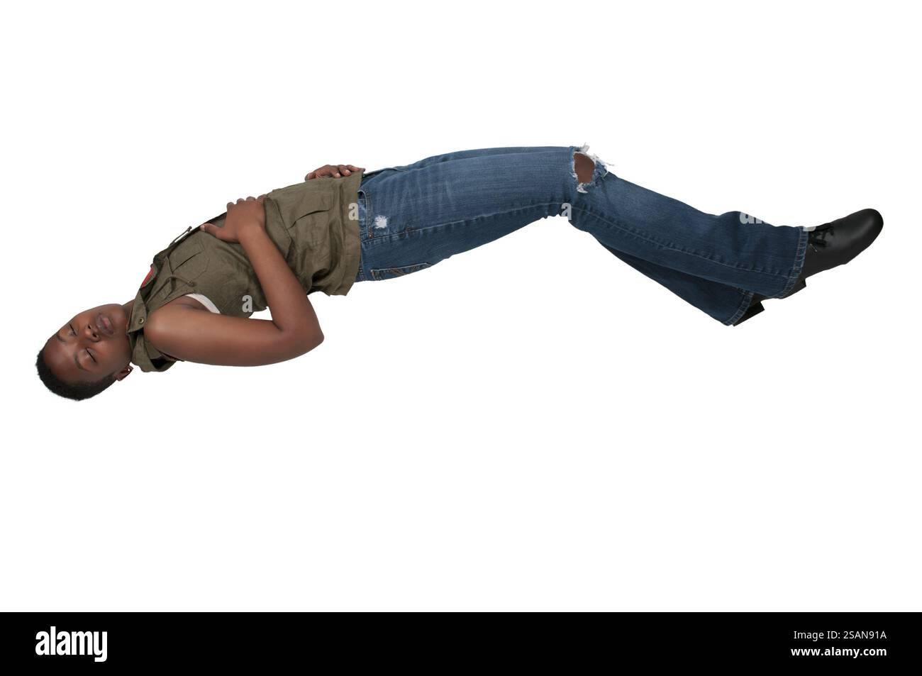 Beautiful young black woman floating in the air Stock Photo - Alamy