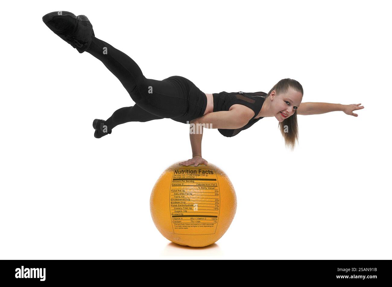 Beautiful woman exercising doing a set of one handed pushups Stock ...