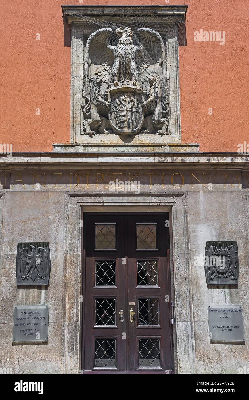 Main entrance with eagle and coat of arms, Oberfinanzdirektion, Munich ...