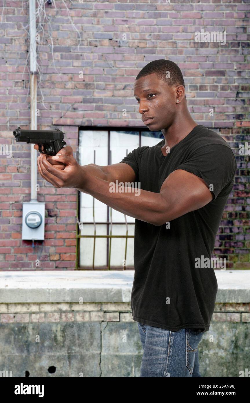 Police detective man on the job with a gun Stock Photo - Alamy