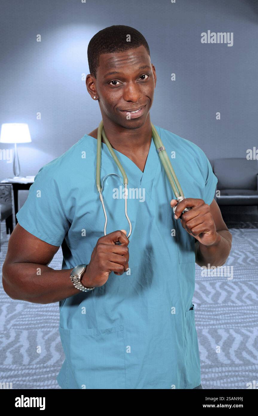Handsome male doctor in a lab coat Stock Photo - Alamy