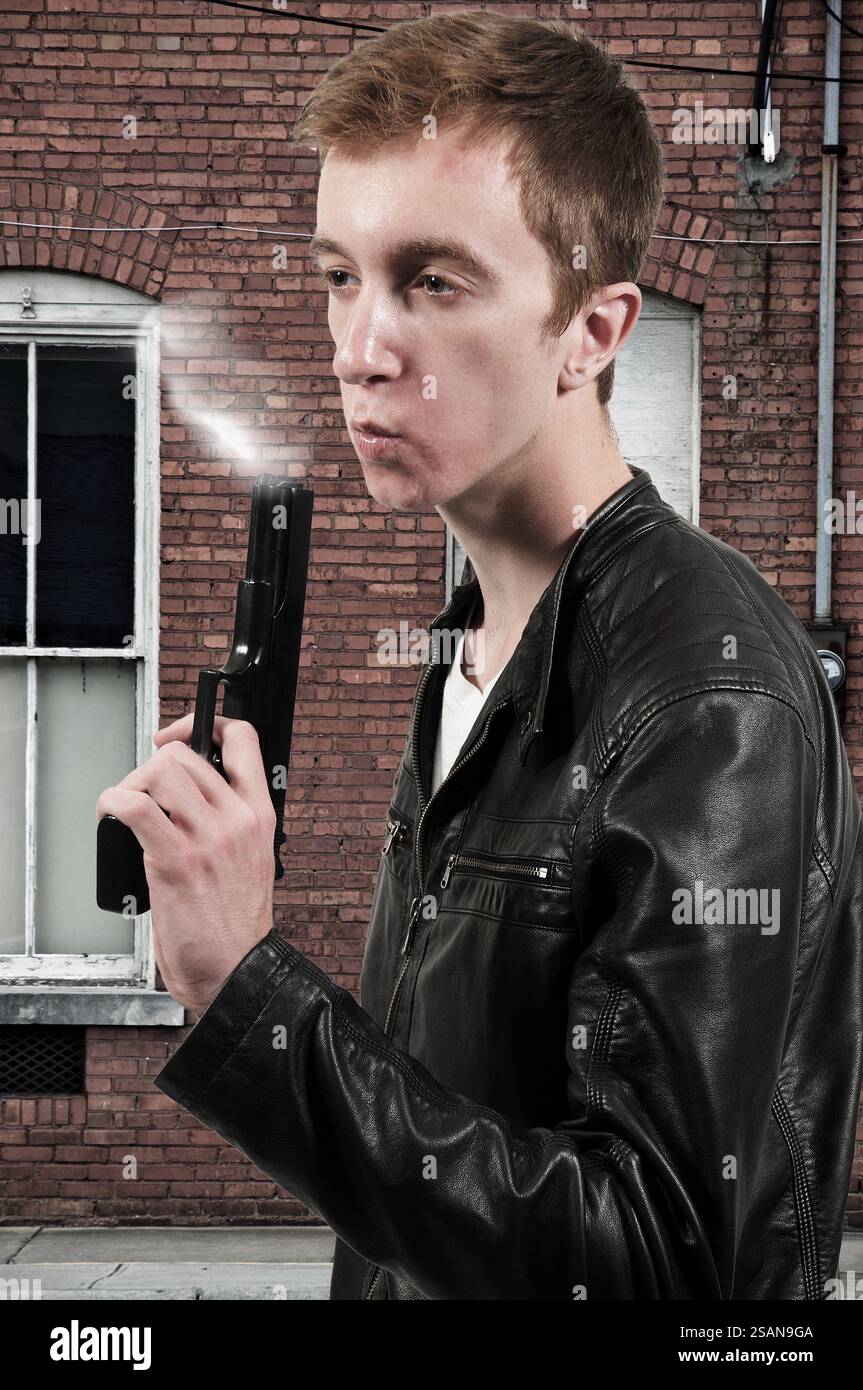 Police detective man on the job with a gun Stock Photo - Alamy
