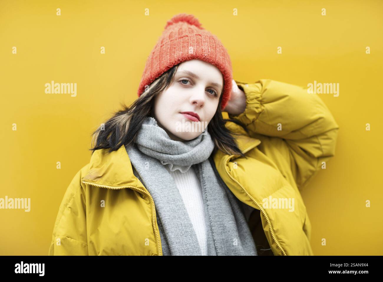 Woman in yellow jacket looks hi-res stock photography and images - Alamy