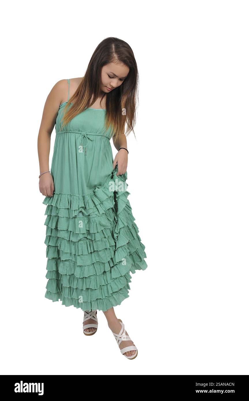 Beautiful young attractive woman modeling her dress Stock Photo - Alamy