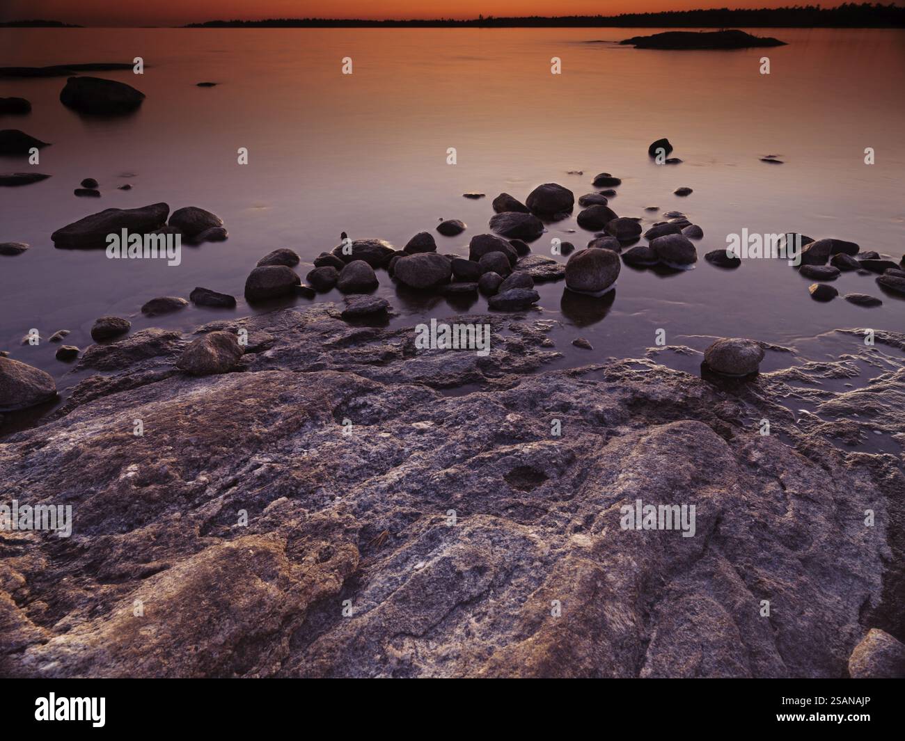 Beautiful twilight scenery of rocks on a shore of Georgian Bay, Muskoka ...