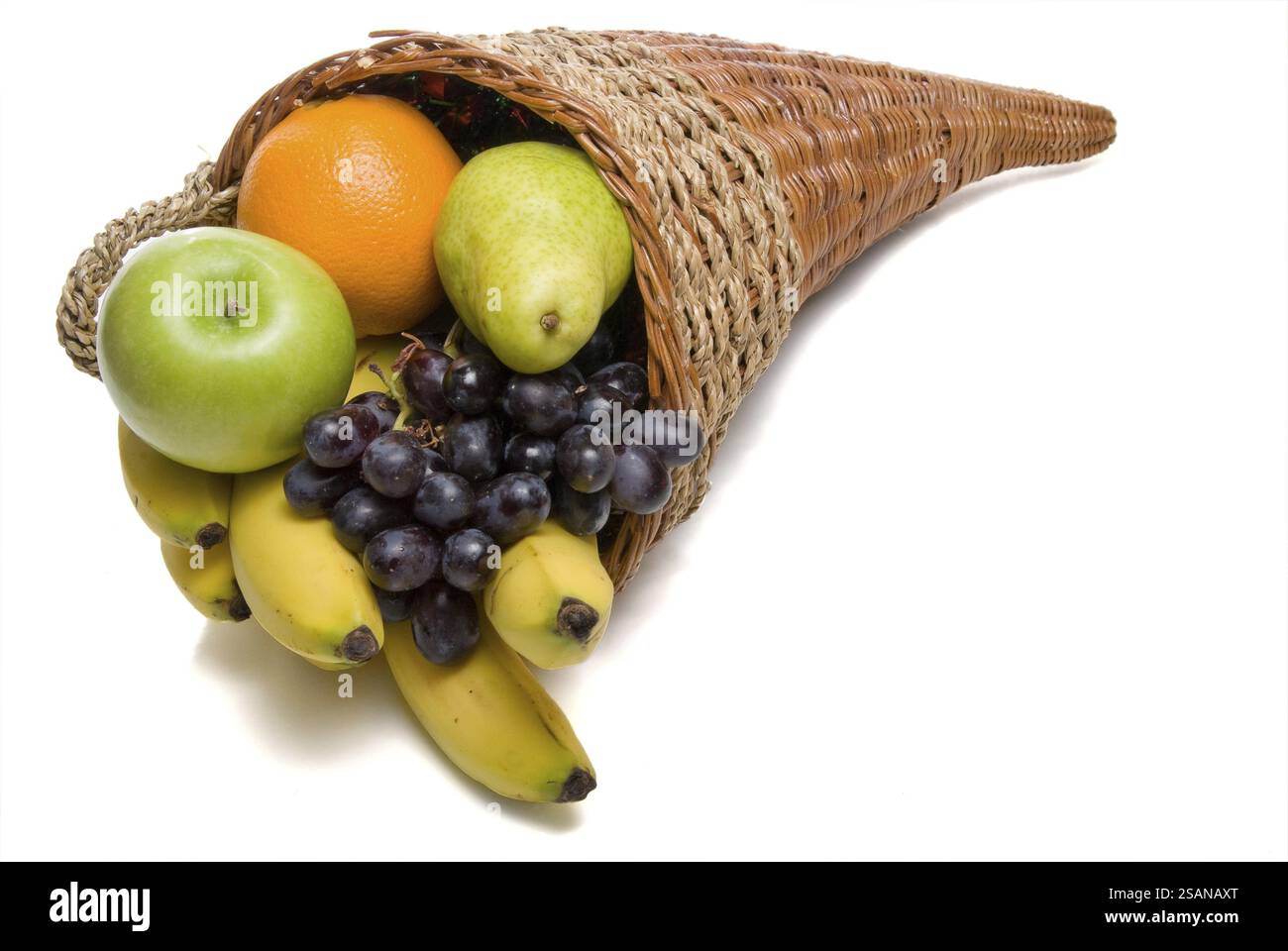 A cornucopia basket filled with delicious fresh fruit Stock Photo - Alamy