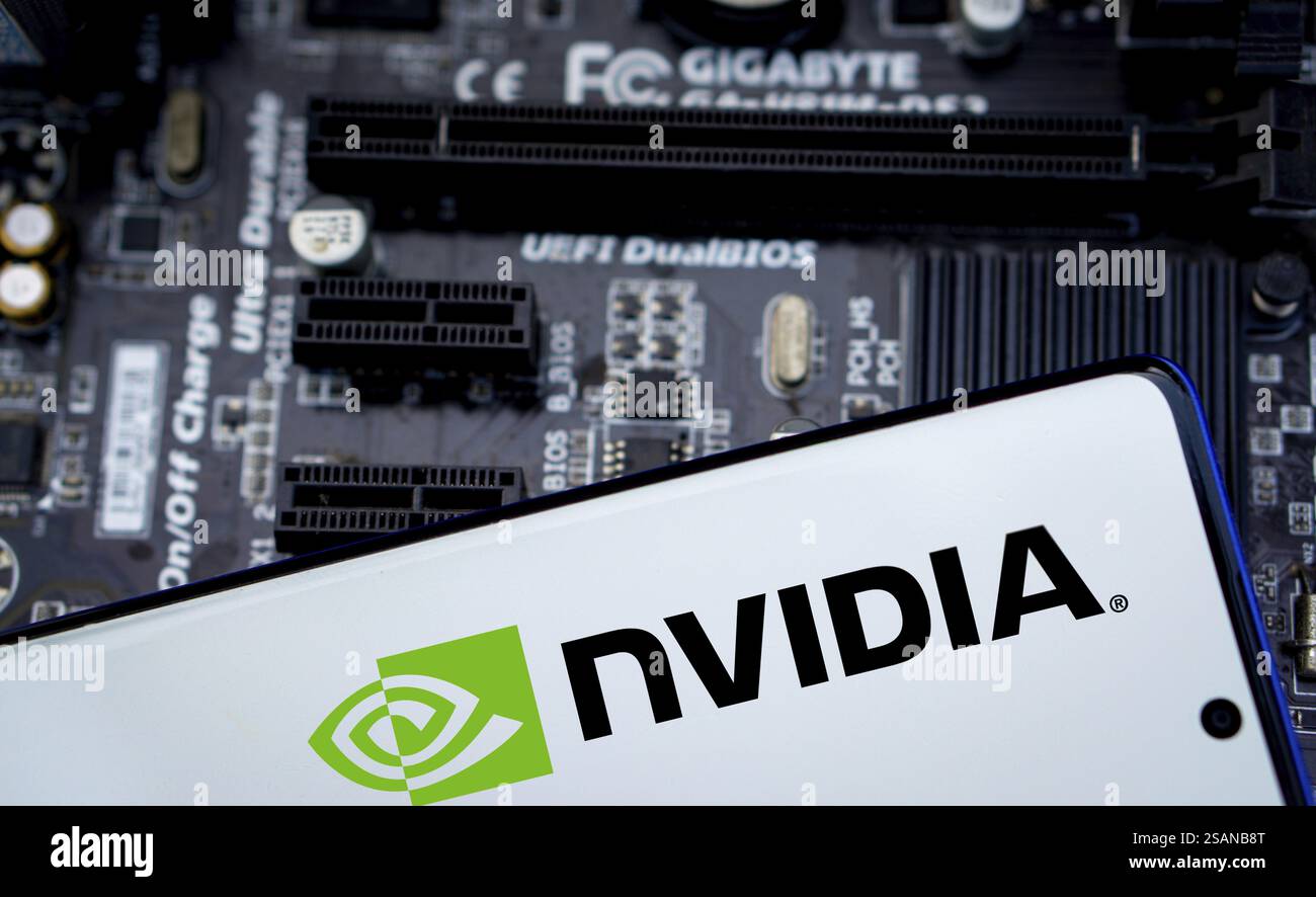 NVIDIA logo on phone and blurred chip on the background-Dhaka ...