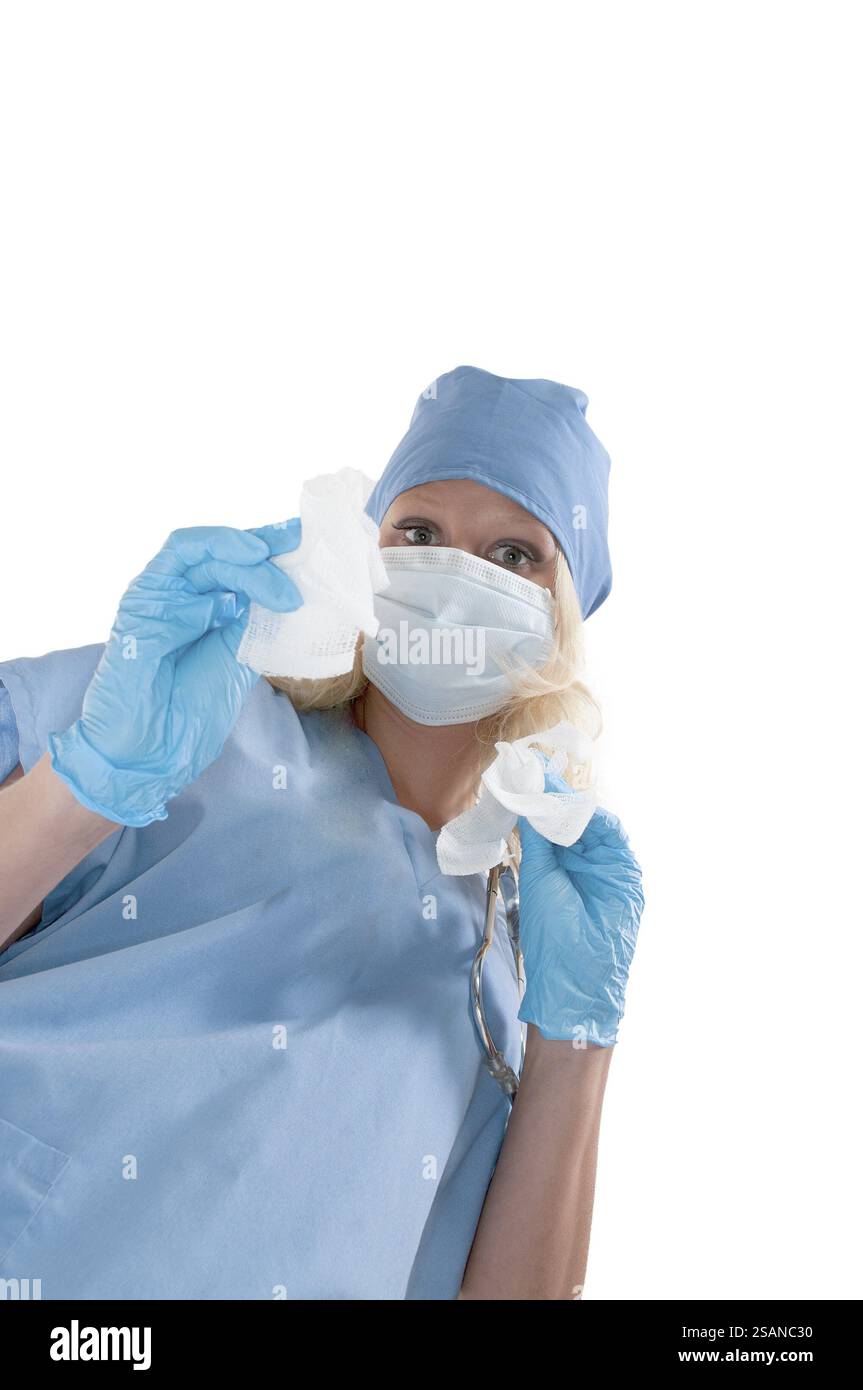 A beautiful young woman surgeon performing surgery Stock Photo - Alamy