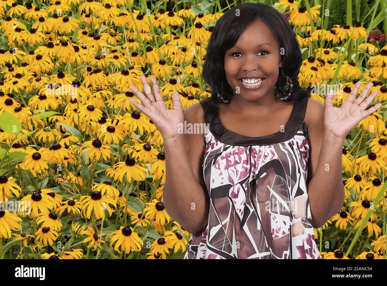 Black woman with the common wild flower known as a Blackeyed Susan ...